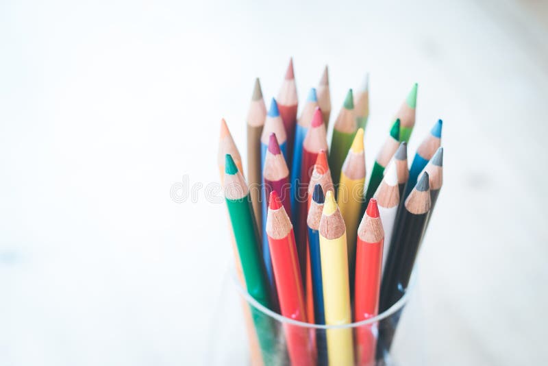 Creativity: Colored Pencils in a Can on Rustic Wooden Table, White ...