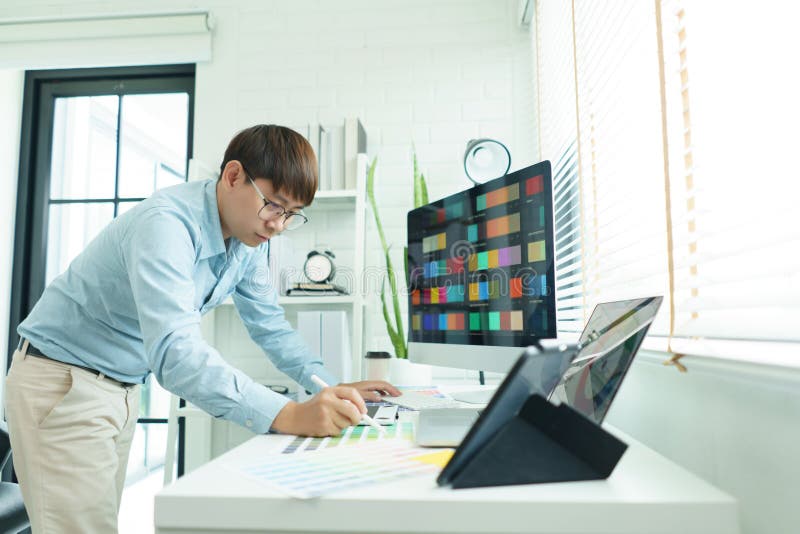 Creativity Concept, Male Graphic Designer Choosing Color Swatch Samples ...