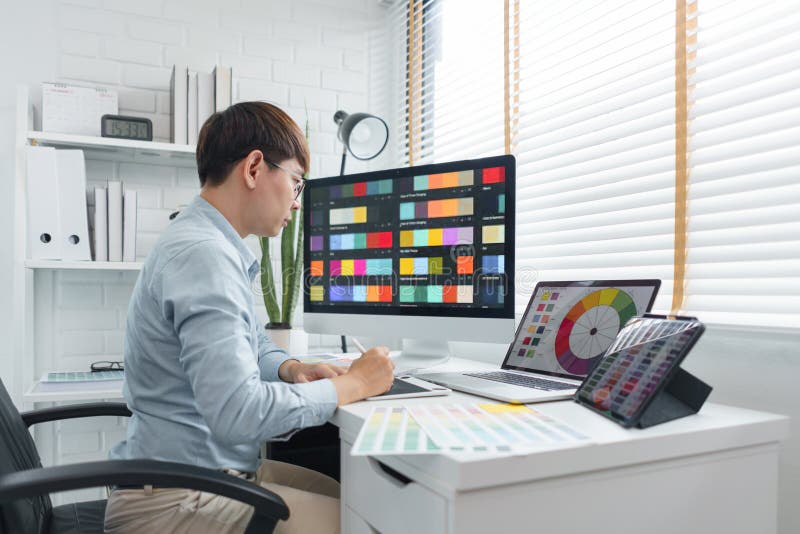 Creativity Concept, Male Graphic Designer Using Tablet and Looking ...