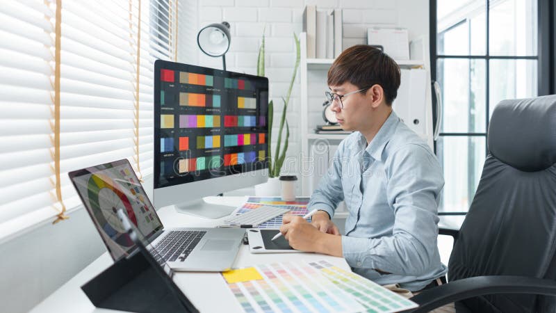 Creativity Concept, Male Graphic Designer Using Tablet and Looking ...