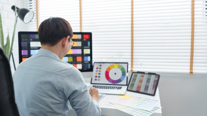 Creativity Concept, Male Graphic Designer Using Tablet and Looking ...