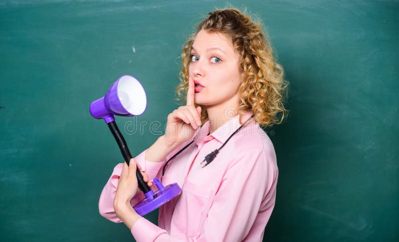 Creativity and Inspiration. Teacher Hold Table Lamp Chalkboard ...