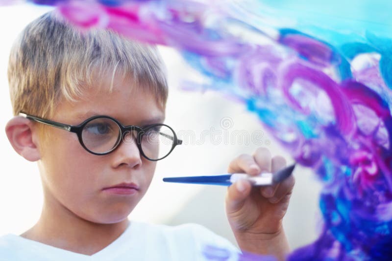 Creativity and Talent. Focused Little Boy Painting on Glass and ...