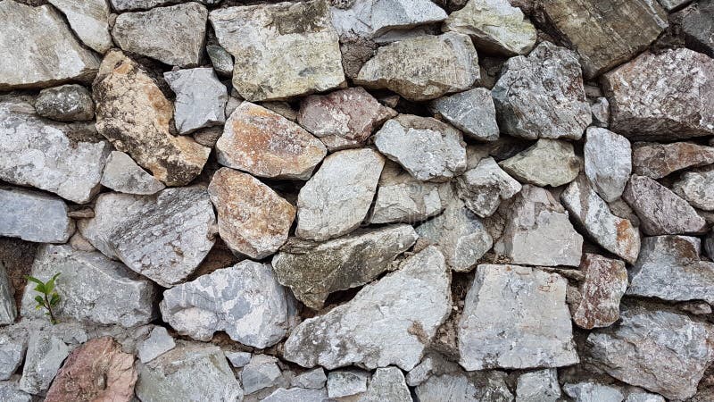 Creativity of Wall Decorated with Small and Big Size of Stone Stock ...