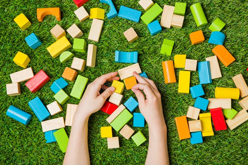 Creativly Constructing from Color Wooden Blocks Stock Image - Image of ...