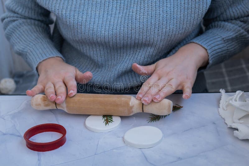Creator is Using White Air Dry Clay for Making Decor To Christmas Tree ...