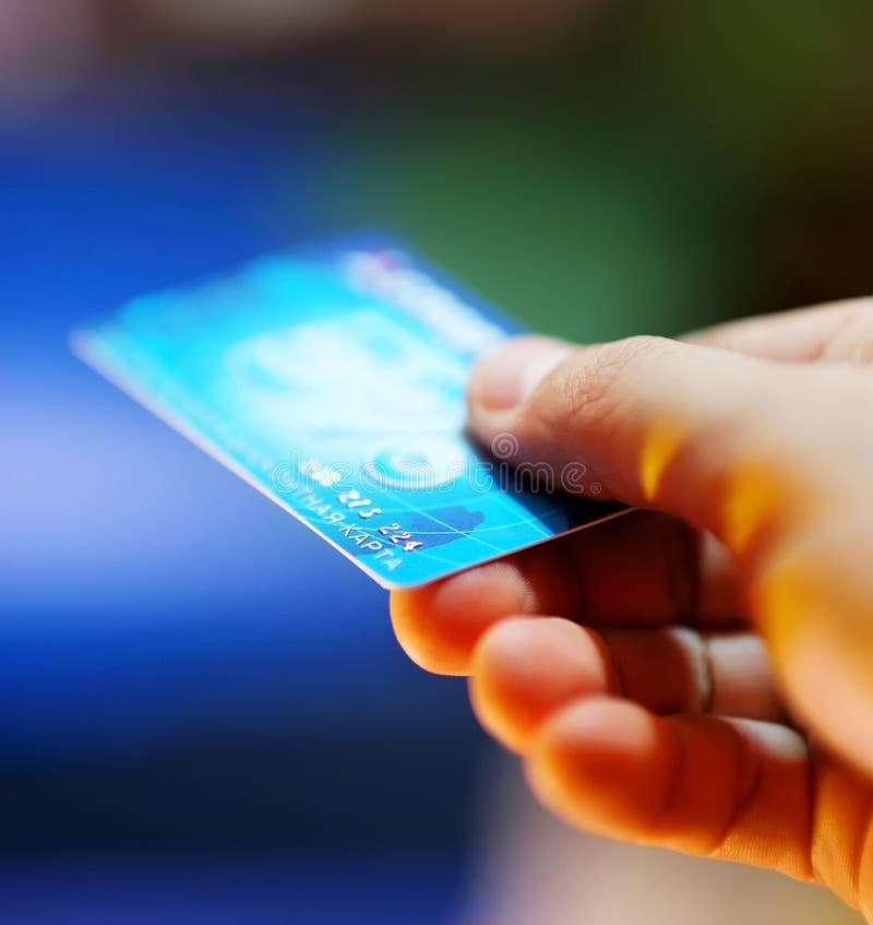 Hand Paying with Credit Card Stock Image - Image of brown, credit: 6736953