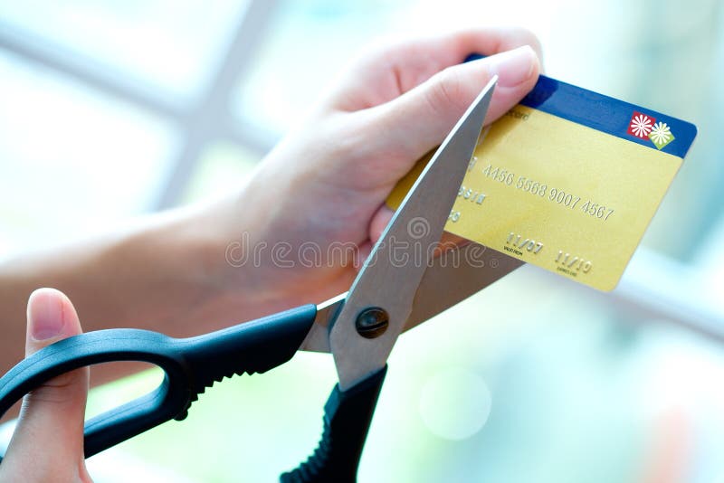 Credit Card Being Cut by Big Pair of Scissors Stock Photo - Image of ...