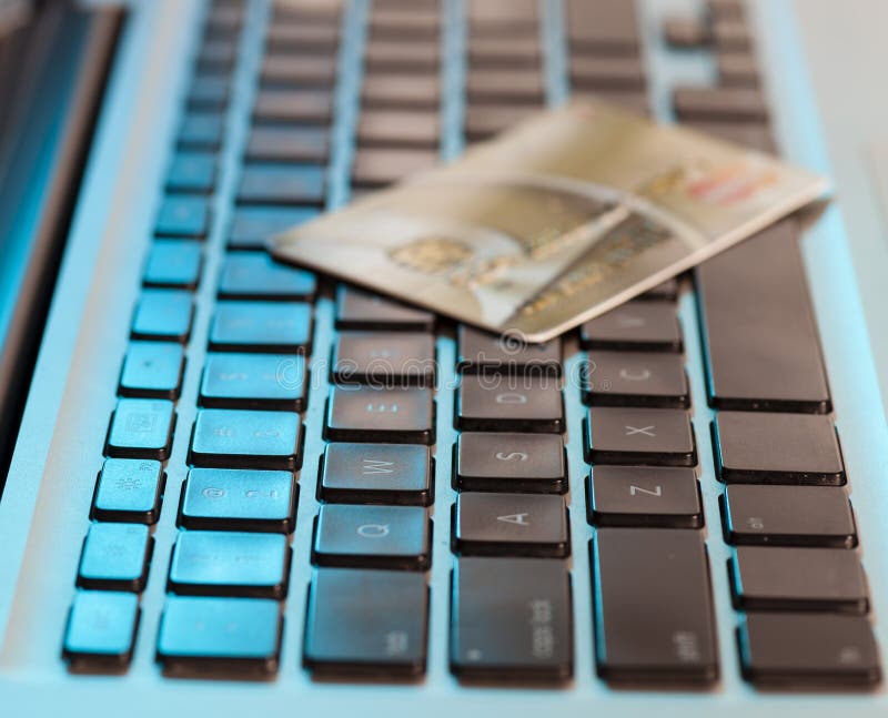 Credit Card on Computer Keyboard Stock Photo - Image of laptop ...