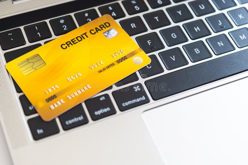 Credit Card on a Computer Keyboard. Internet Purchase Concept Editorial ...
