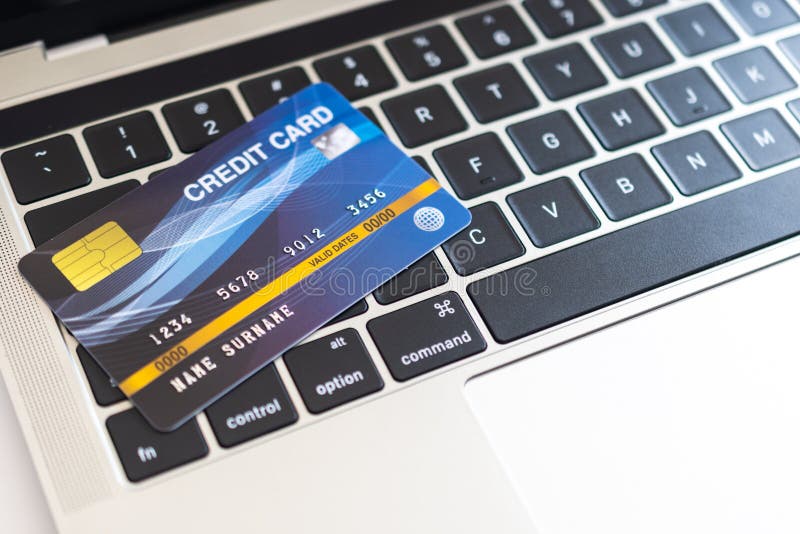 Credit Card on a Computer Keyboard. Internet Purchase Concept Editorial ...