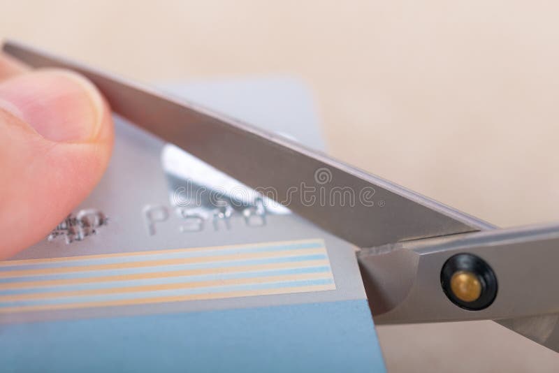 Credit Card Cutting Process with Scissors.Soft Focus Stock Photo ...