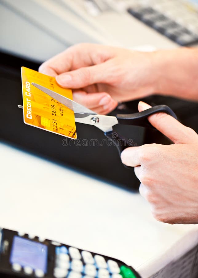 Cutting a credit card stock photo. Image of destruction - 25063880