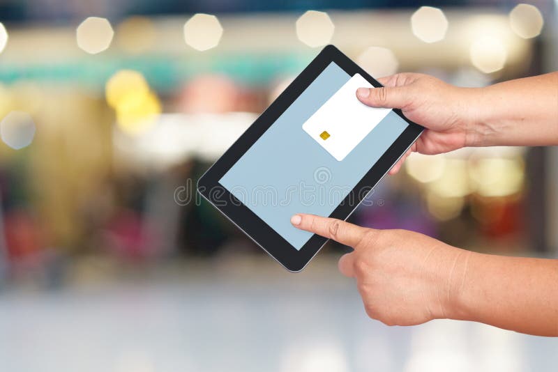 Credit Card or Debit Card and Tablet in Hand,E Money Stock Photo ...