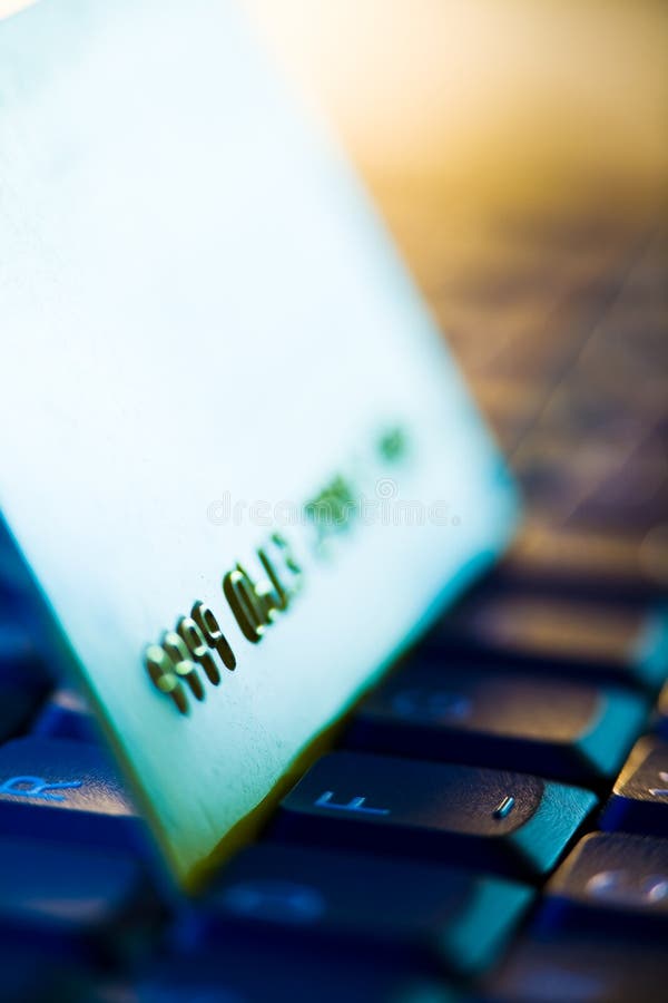 Credit Card on Laptop Keyboard Stock Photo - Image of commerce, spend ...