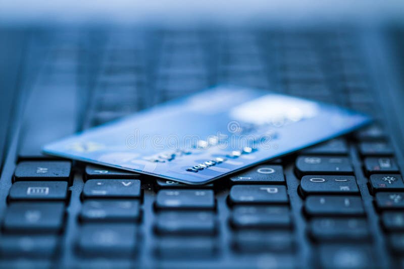 Credit card on keyboard stock image. Image of notebook - 45011137