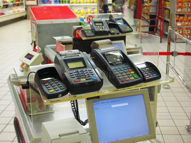 Cashier in a supermarket editorial photo. Image of credit - 52170546