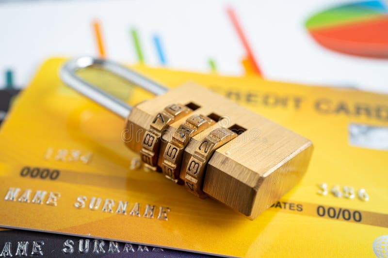 Credit Card with Password Key Lock and US Dollar Banknotes Stock Photo ...