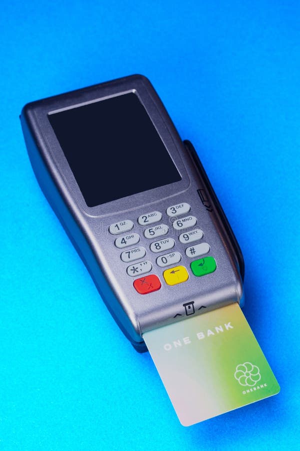 Credit Card Reader with a Credit Card Inserted in the Front Slot ...