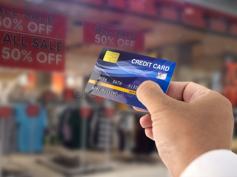 Credit card and shopping stock image. Image of holding - 162049821