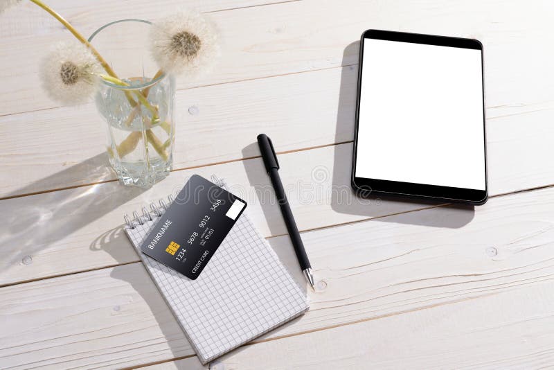 Credit Card, Tablet and Notebook with Pen on the Table Stock Image ...
