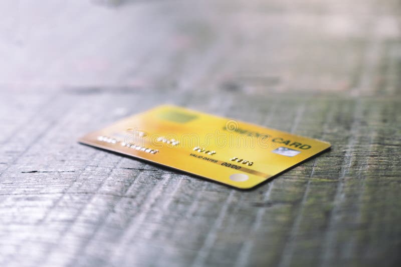 A credit card on the table stock photo. Image of black - 158558146