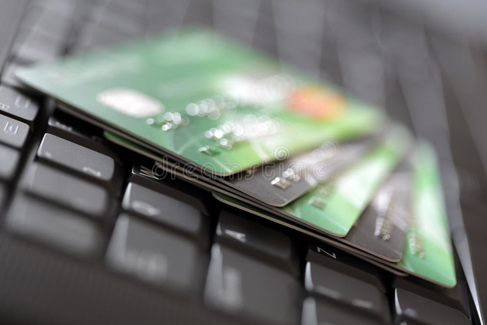 Credit Cards on Computer Keyboard Stock Image - Image of paying ...