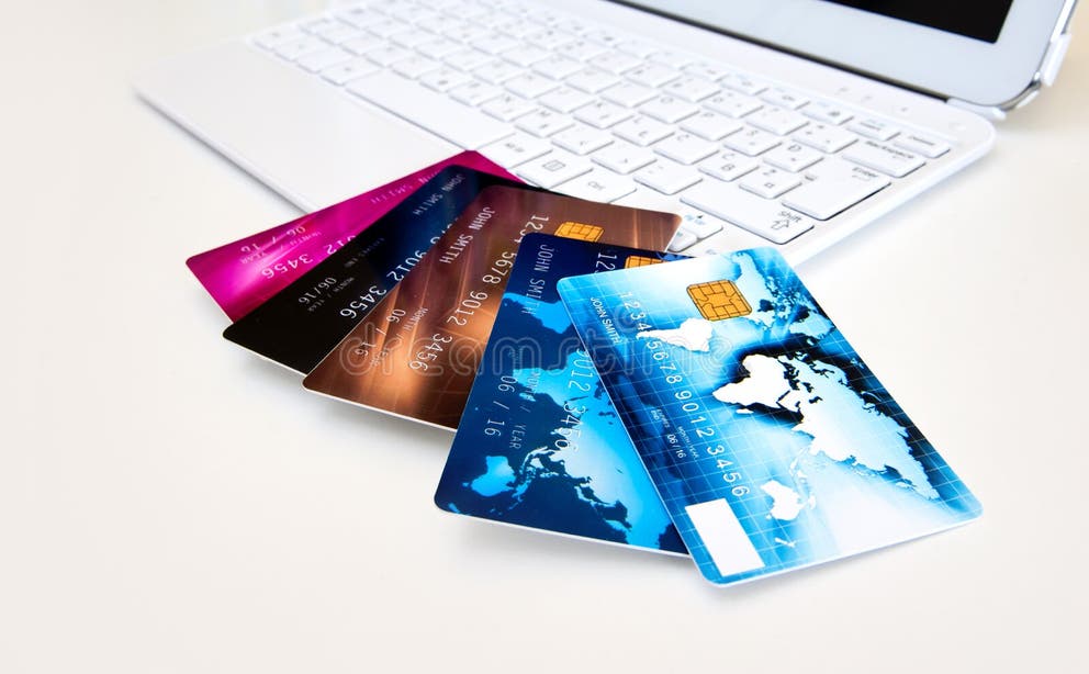 Credit cards on computer stock image. Image of customer - 40572837