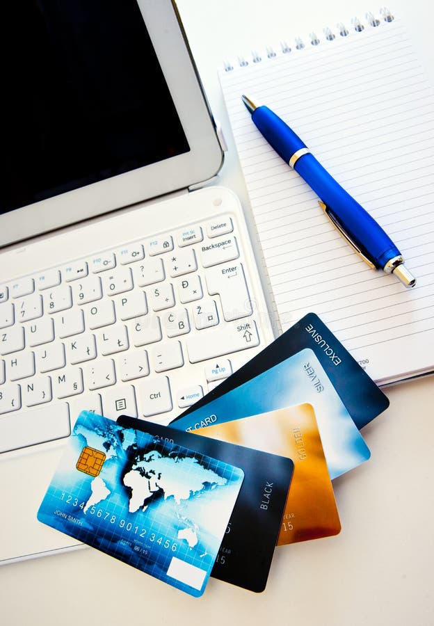 Credit cards on computer stock photo. Image of purchasing - 40573174