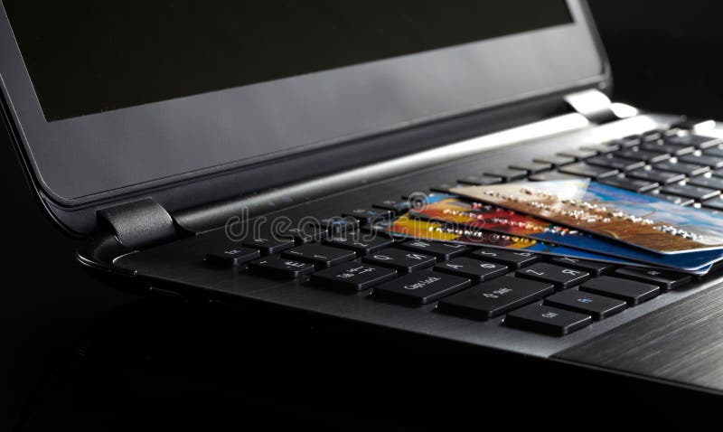 Credit Cards on a laptop stock image. Image of banking - 33769073