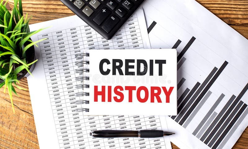 CREDIT HISTORY Text on a Notebook with Chart and Calculator Stock Photo ...