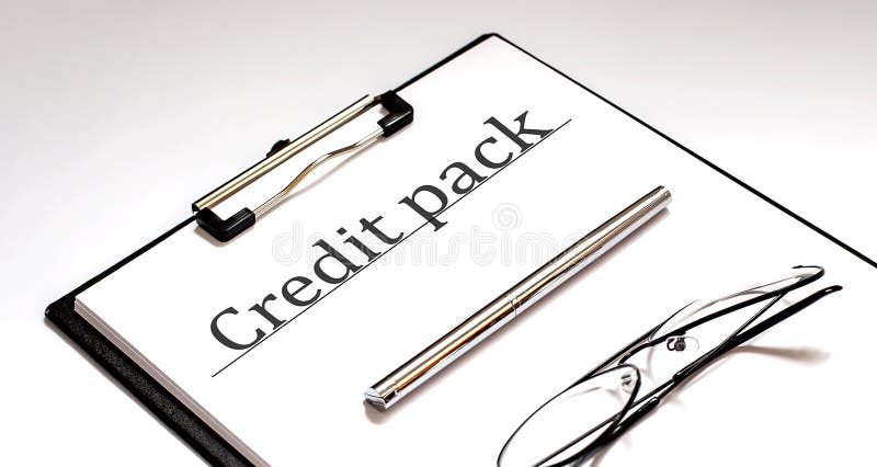 CREDIT PACK Text Written on a Paper with Pen and Glasses Stock Image ...