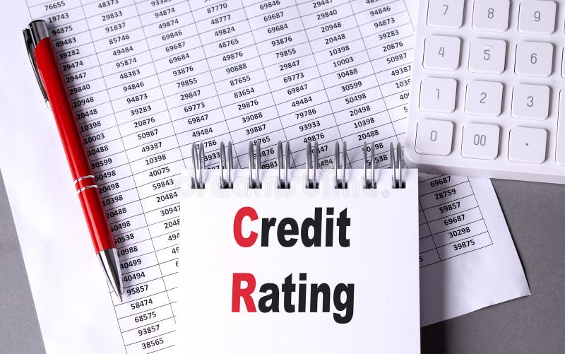 CREDIT RATING Text on Notebook with Chart , Pen and Calculator Stock ...