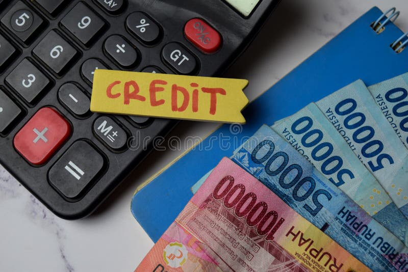Credit Write on Sticky Note and Rupiah Banknotes Isolated on Office ...
