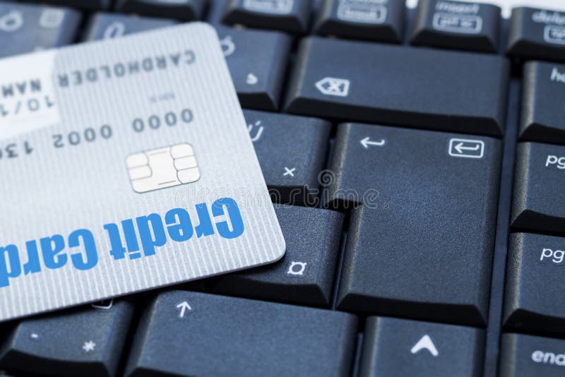Credits Card on a Computer Keyboard Stock Image - Image of laptop ...