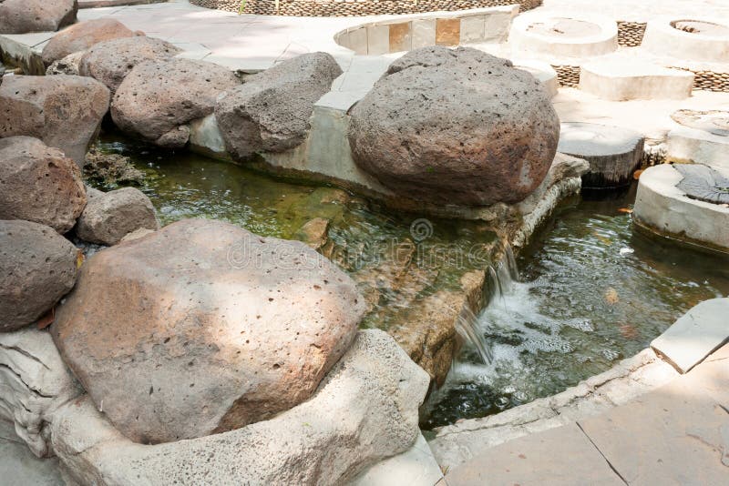 Creek rocks in the garden stock image. Image of sand - 174757823