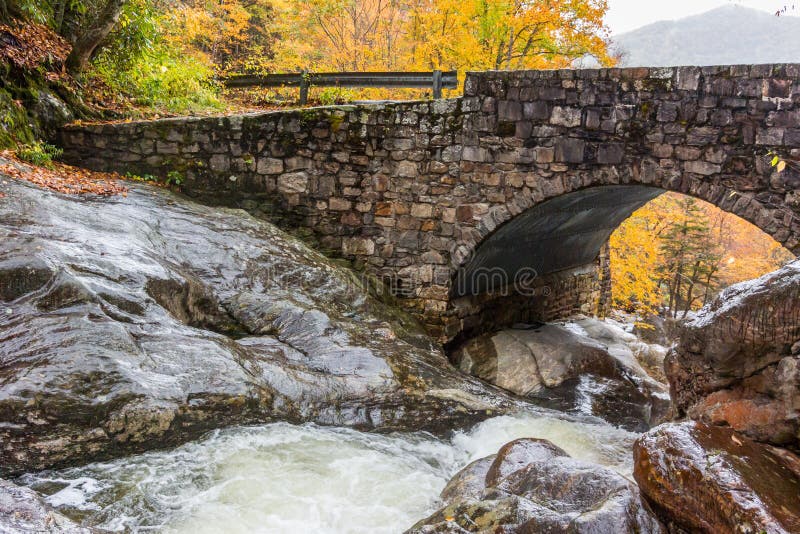 Creek Underneath Stone Bridge in Fall Stock Image - Image of rural ...