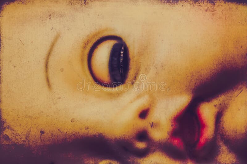 Creepy Doll Eye Closeup stock image. Image of distressed - 129127193