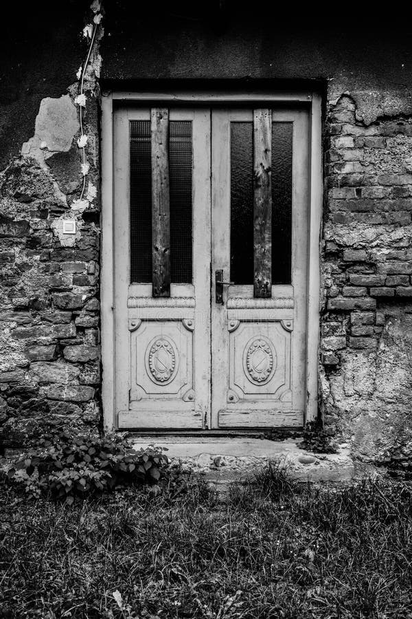 Creepy doors stock image. Image of house, white, doors - 47418373