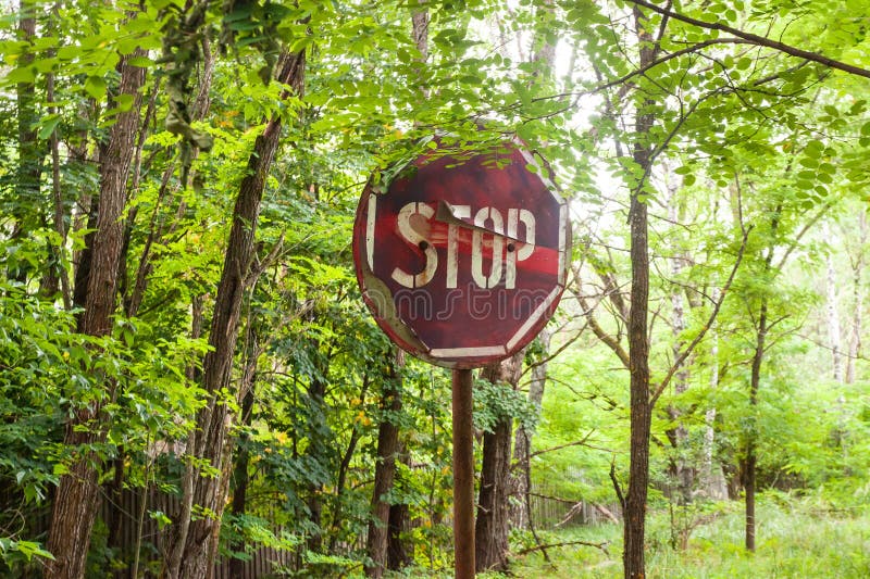 Creepy Stop Road Sign in the Middle of an Abandoned Area Stock Photo ...