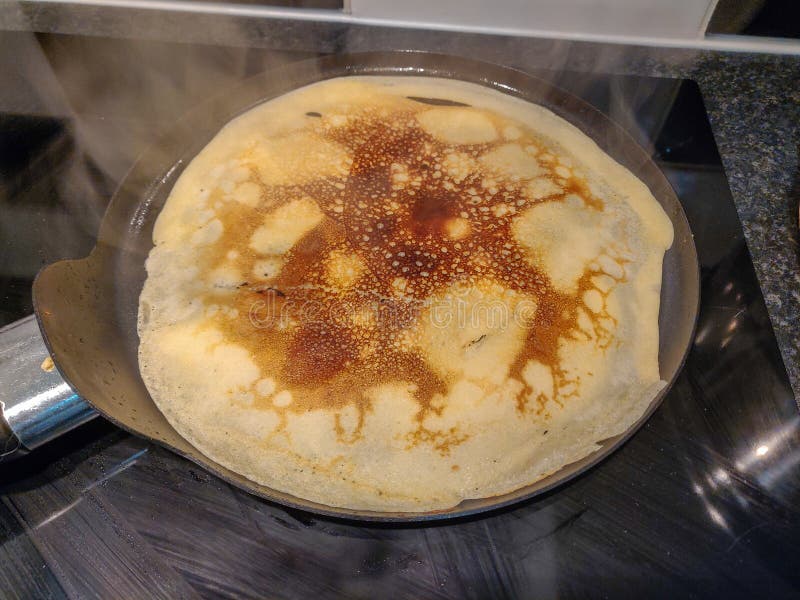 Crepe Cooking in a Frying Pan Stock Photo - Image of breakfast, cook ...