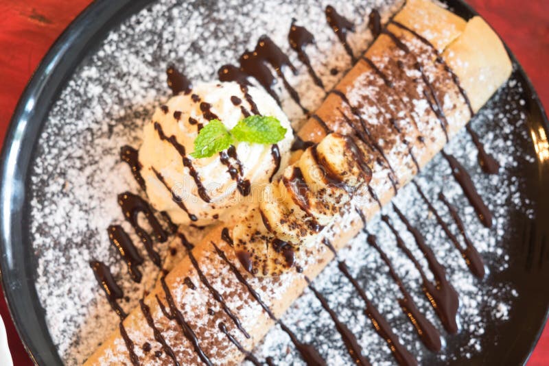Crepe Filled with Slice Banana and Chocolate Syrup Stock Photo - Image ...