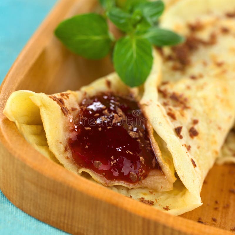 Crepe with Strawberry jam stock photo. Image of leaf - 24920702