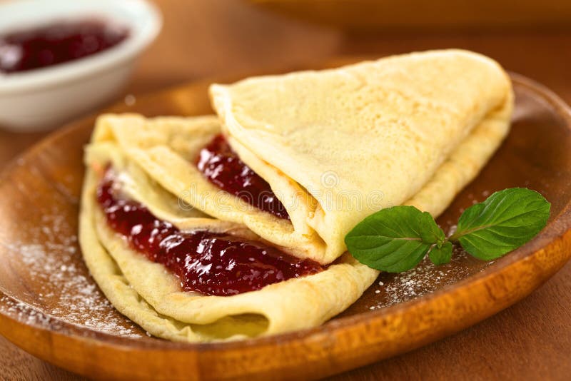 Crepe with Strawberry jam stock photo. Image of leaf - 24920702