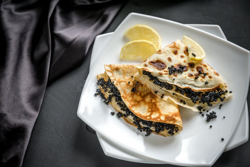 Crepes with black caviar stock photo. Image of baked - 48289374