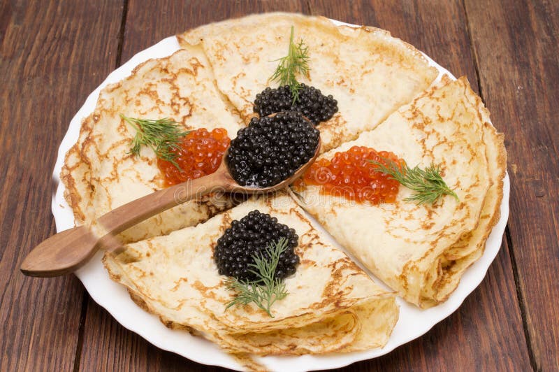 Traditional Russian Crepes with Black and Red Caviar. Stock Image ...
