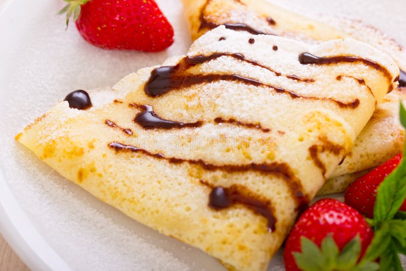 Crepes with Chocolate Syrup and Strawberry Stock Image - Image of bread ...