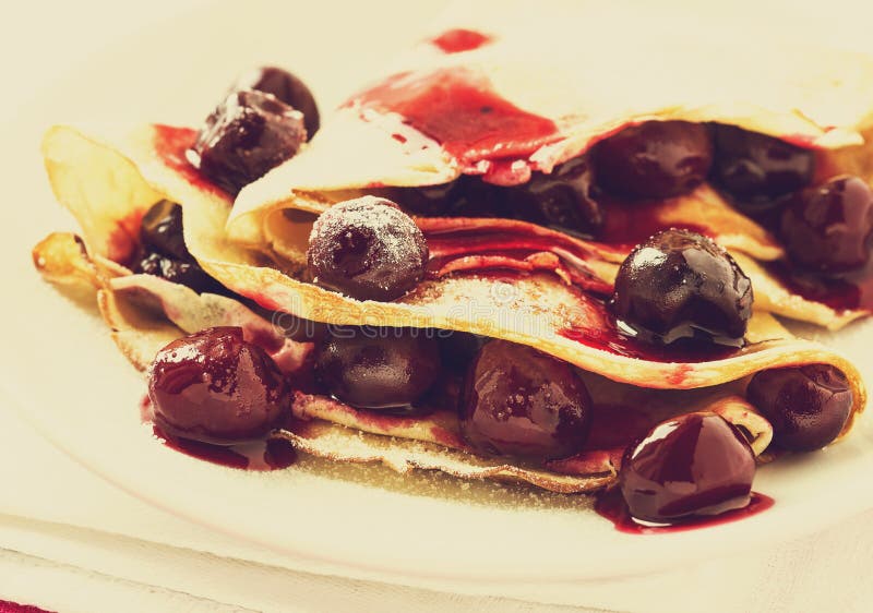 Crepes filled with cherry stock image. Image of eating - 40591761