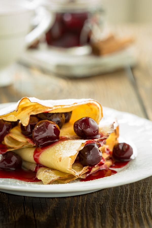 Crepes filled with cherry stock image. Image of eating - 40591761