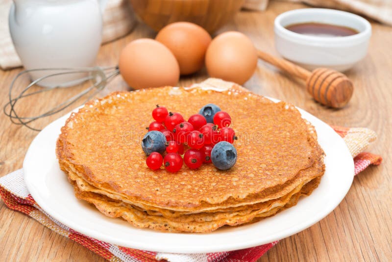 Crepes with Fresh Berries and Ingredients for Baking, Horizontal Stock ...